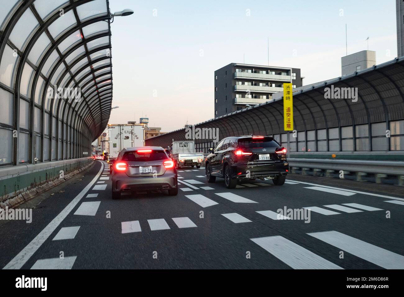 Tokyo, Japan. 25th Nov, 2022. Car motor vehicle traffic travels during ...