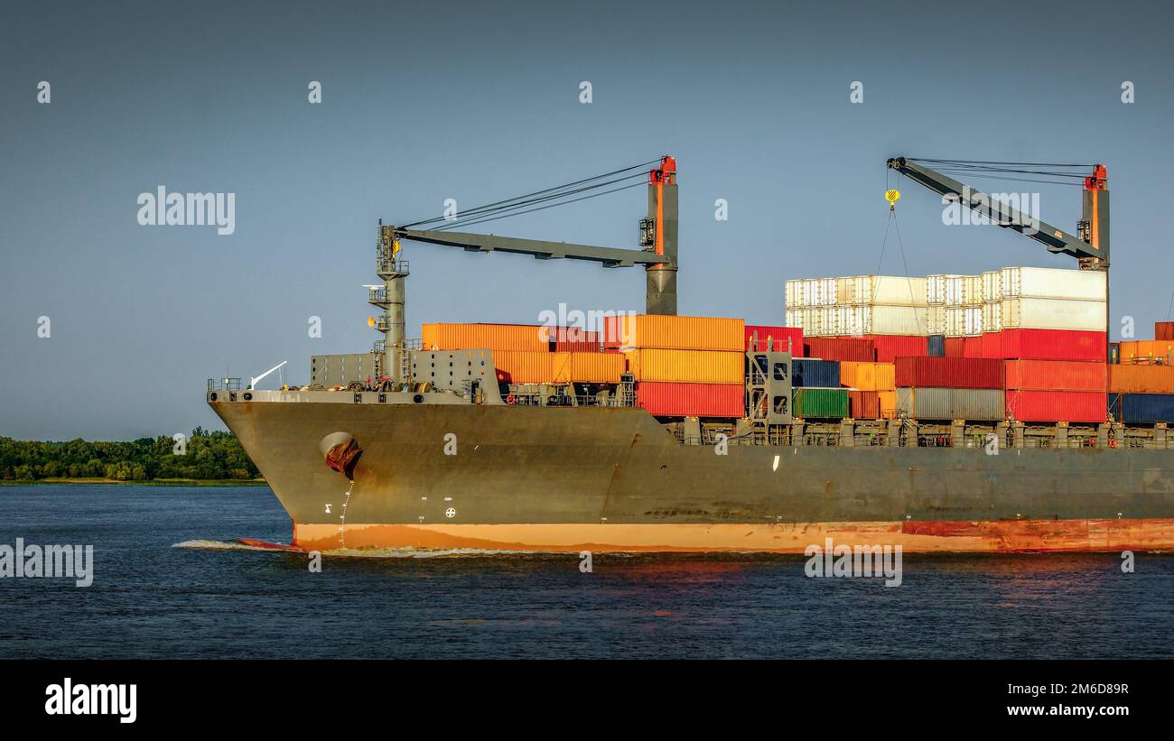 Container ship on the river Elbe Stock Photo - Alamy
