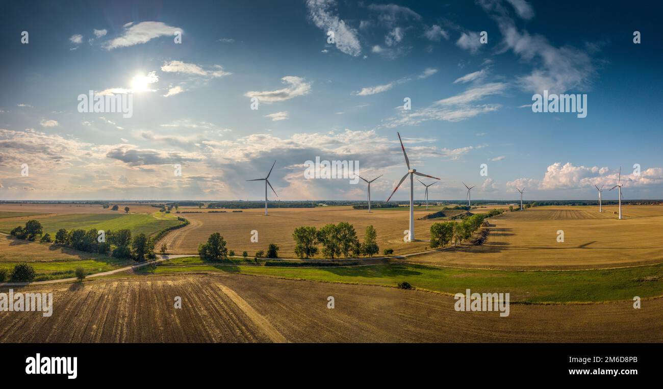 Panorama of a beautiful landscape with windmills when the weather is ...