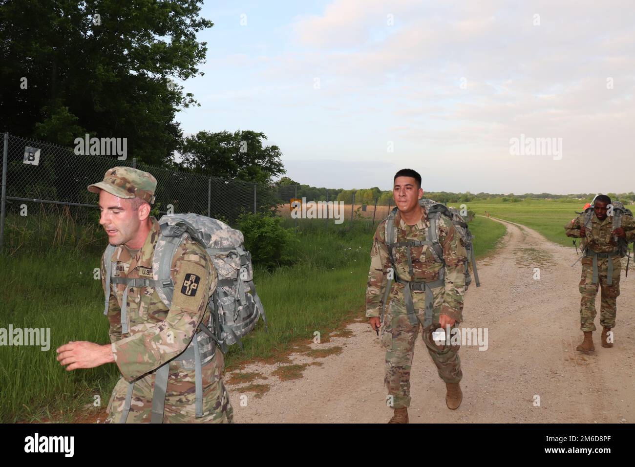 Sgt. Maldonado, Sgt. De La Cruz, and Cpl. James all perform the ruck ...