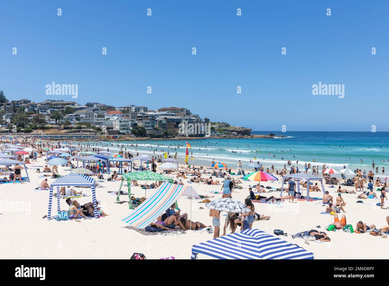 Iconic Bondi Beach in Sydney eastern suburbs, blue sky summers day 2023 ...