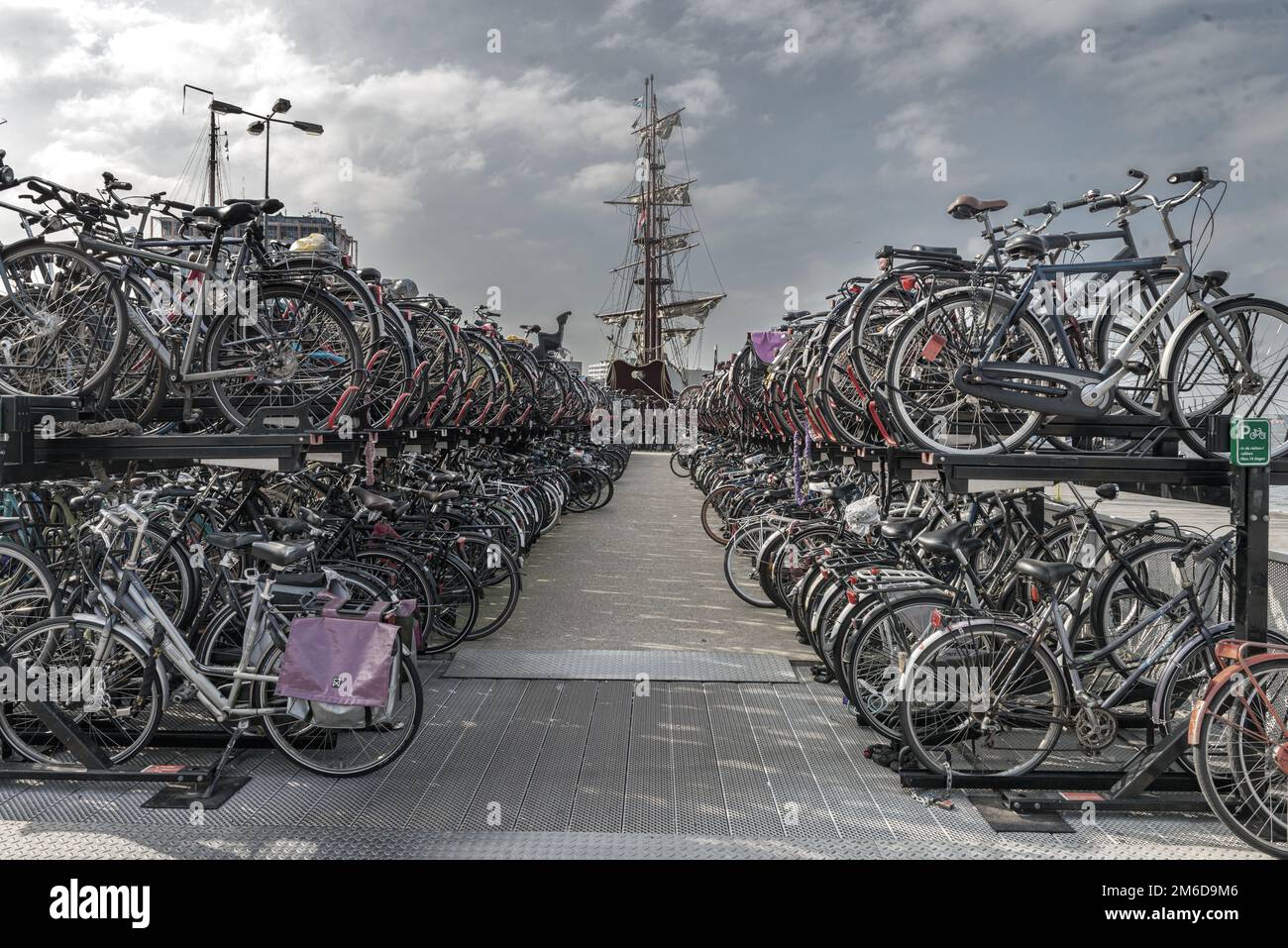 Thousands of bicycles parked in a public bicycle parking lot in ...