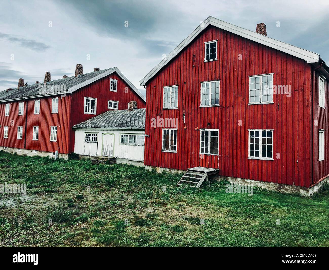 Scandinavian house row in classic Swedish red Stock Photo - Alamy