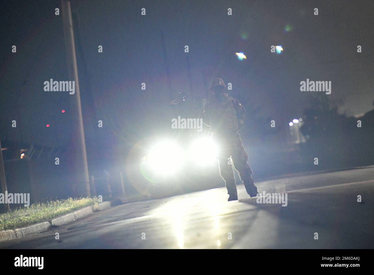 A Humvee approaches Tech. Sgt. Von Schmidt, 8th Fighter Wing Safety ...