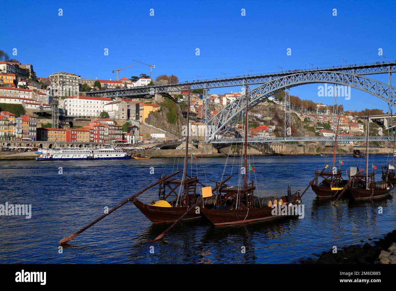 Traditional rabelo boats, Porto city skyline, Douro river and and Dom ...