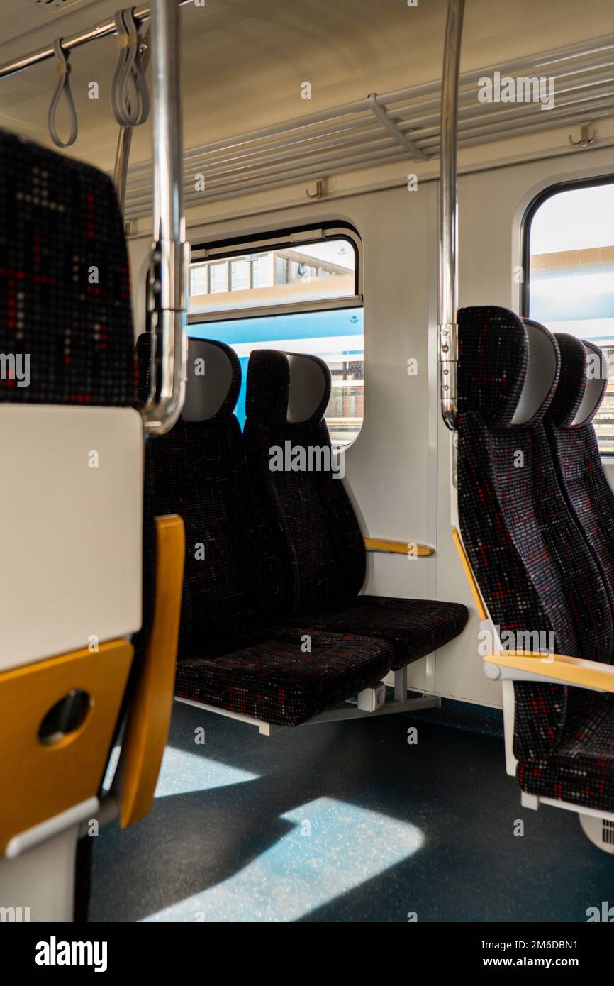 View on railroad track from the window of fast train. Interior view at ...