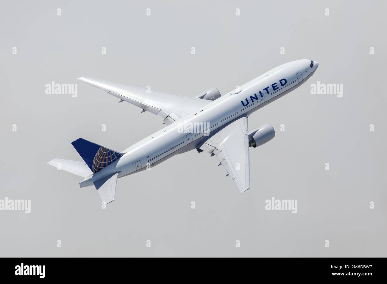 United Airlines Boeing 777-200 airplane Los Angeles airport aerial view ...