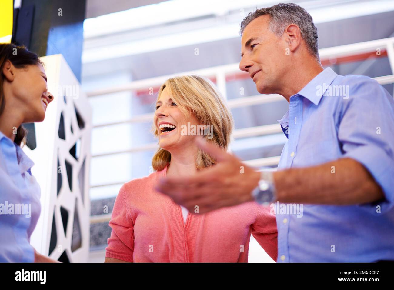 Throwing ideas around. business colleagues having a discussion in an ...