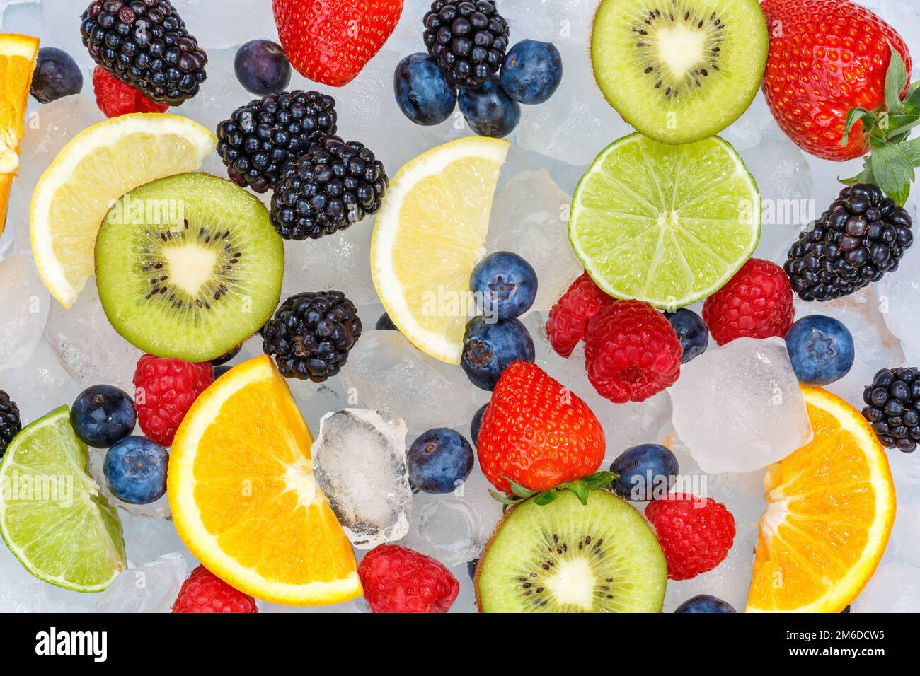 Fruits berry food background oranges strawberries ice cubes fresh fruit ...
