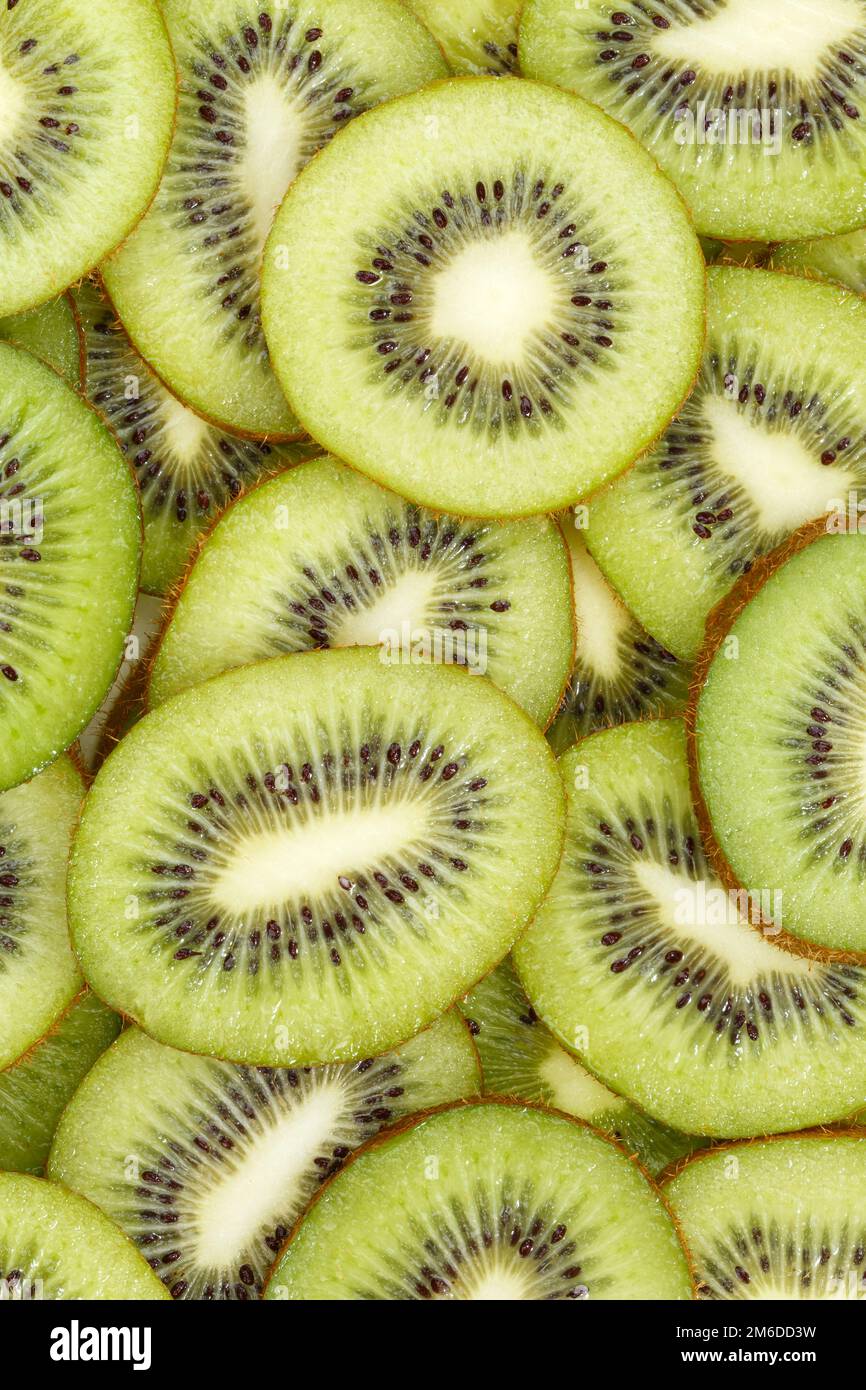 Kiwi fruits collection food background portrait format slices kiwis ...
