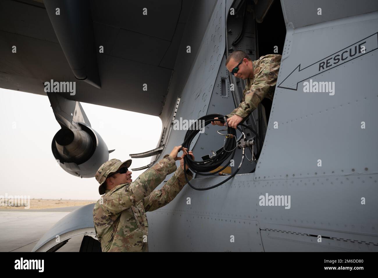 U.S. Air Force Tech. Sgt. Richard Shifflett, right, C-17 avionics ...