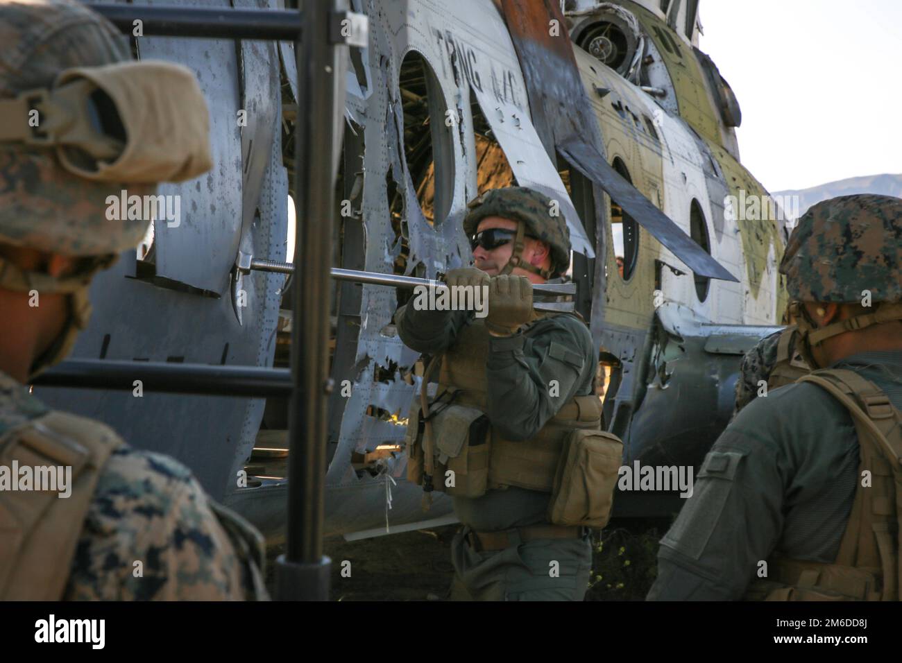 U.S. Marine Corps Cpl. Joshua A. Hayes, an expeditionary fire fighter ...