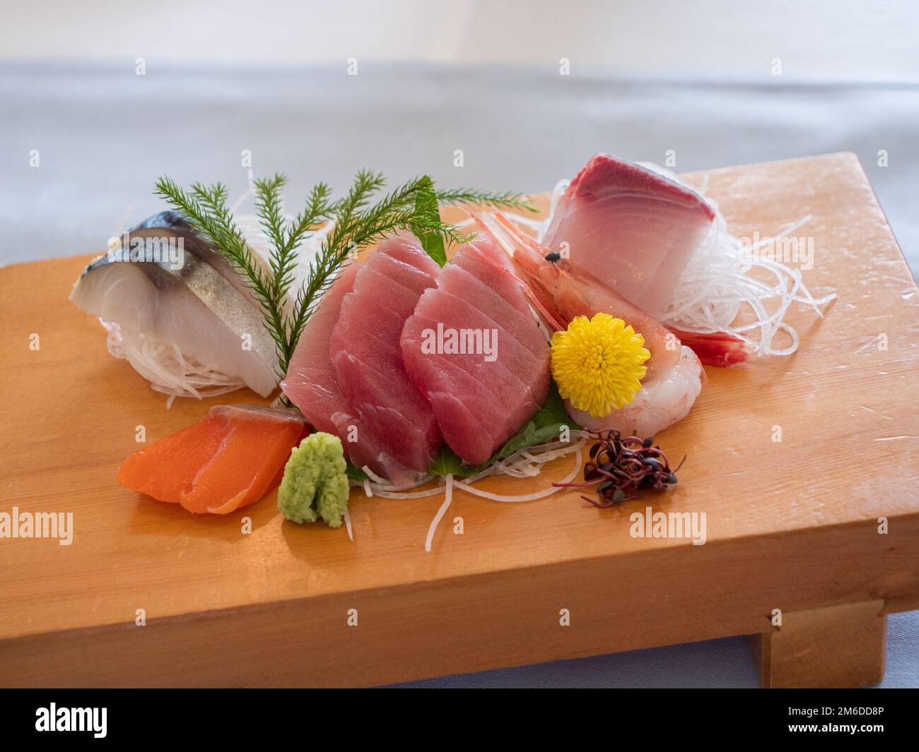 Japanese sashimi beautifully presented on a wooden board Stock Photo ...