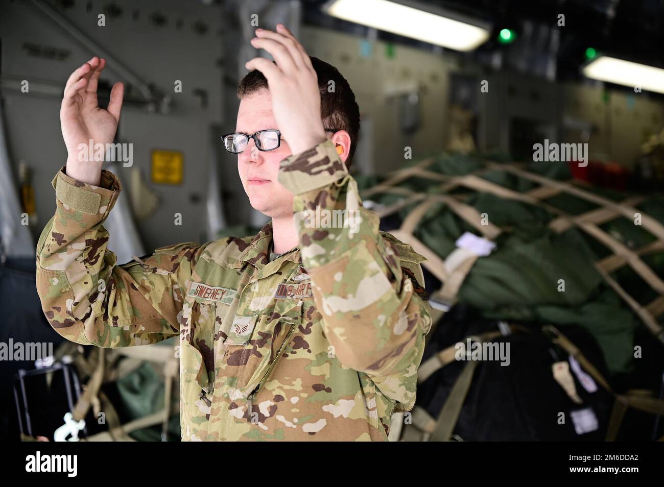 U.S. Air Force Airman 1st Class Brandon Sweeney, C-17A Globemaster III ...