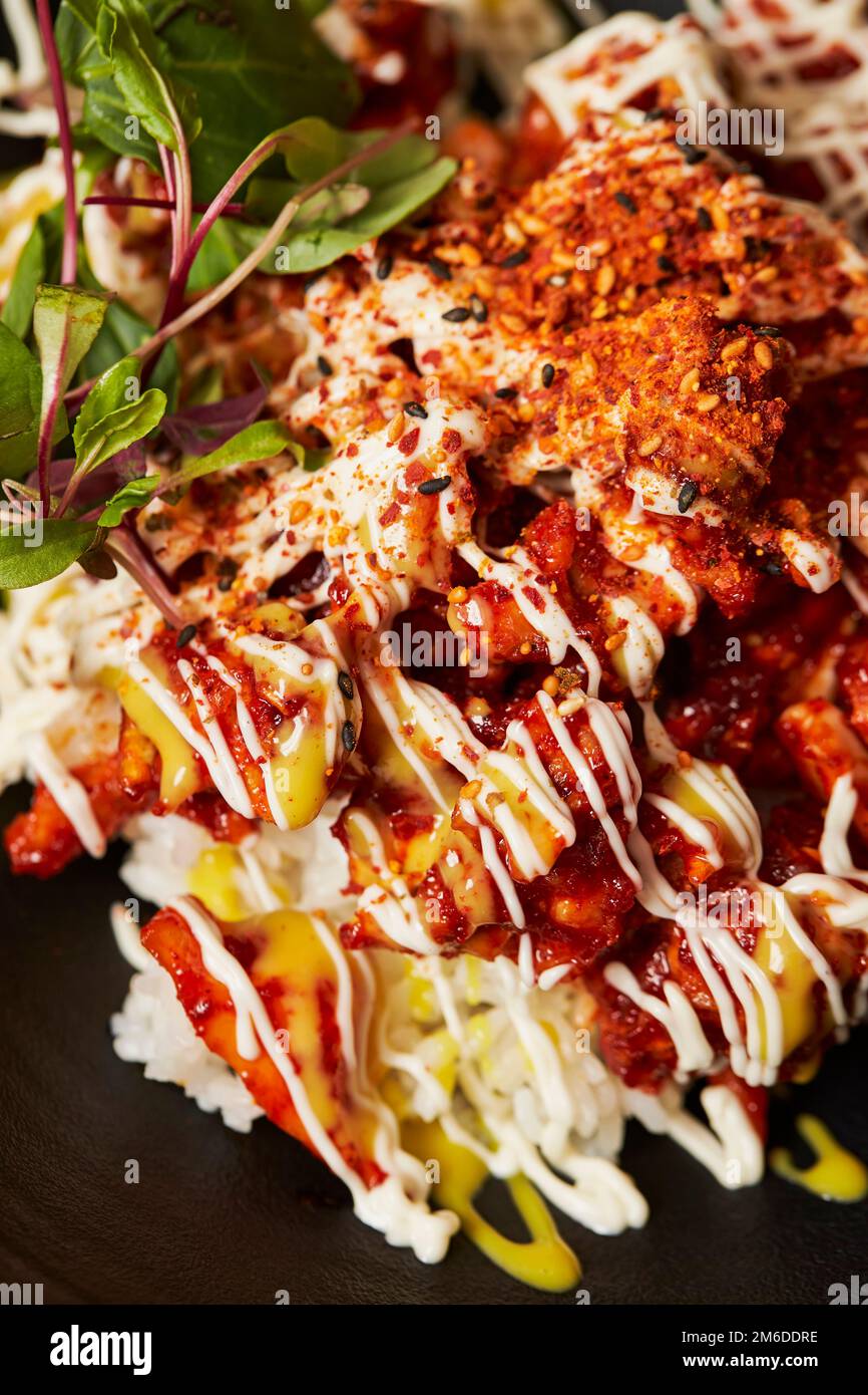 Spicy Chicken Fried Rice Bowl Stock Photo - Alamy
