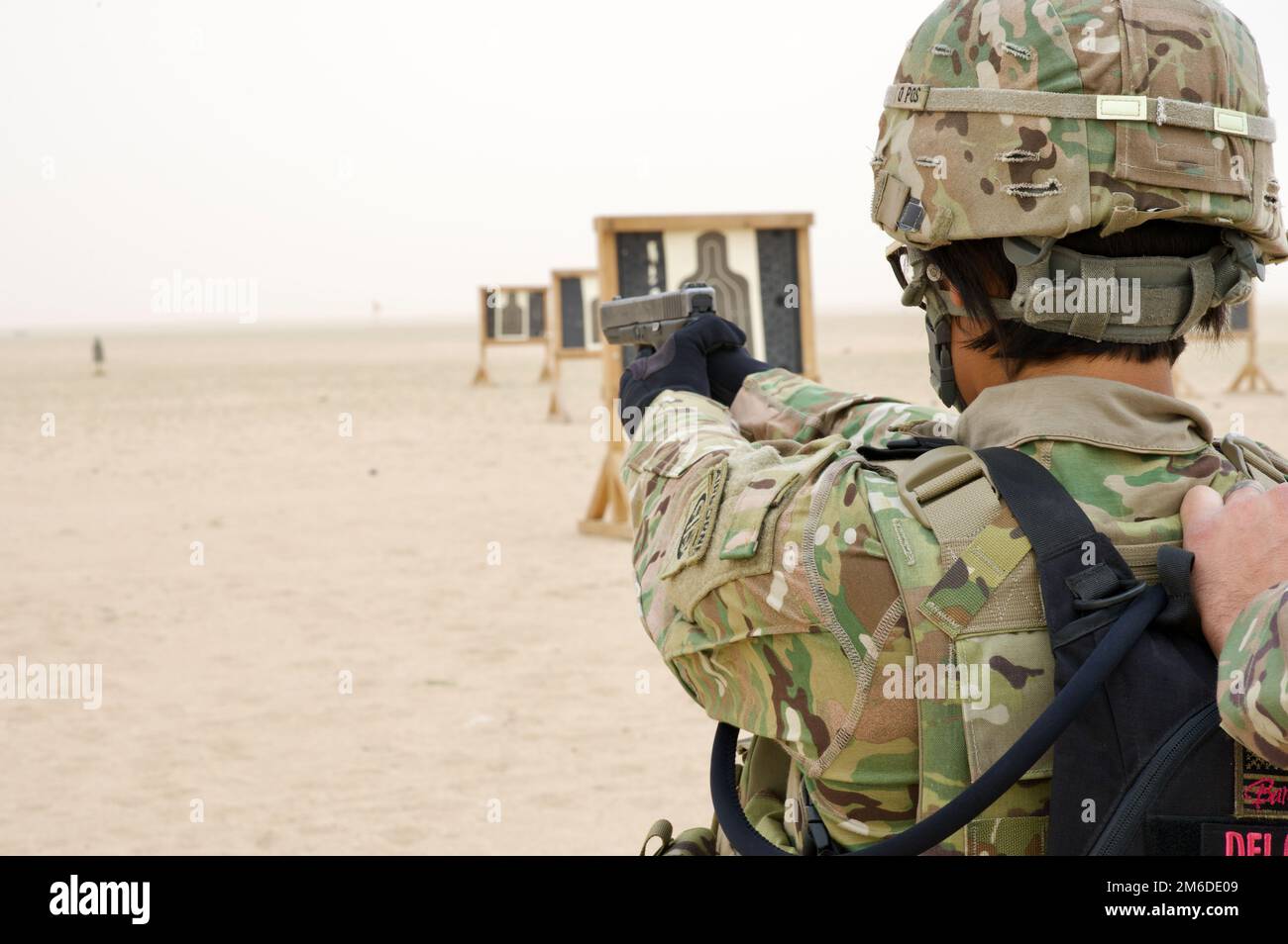 U.S. Army Specialist Angel Delatorre, a parachute rigger assigned to ...