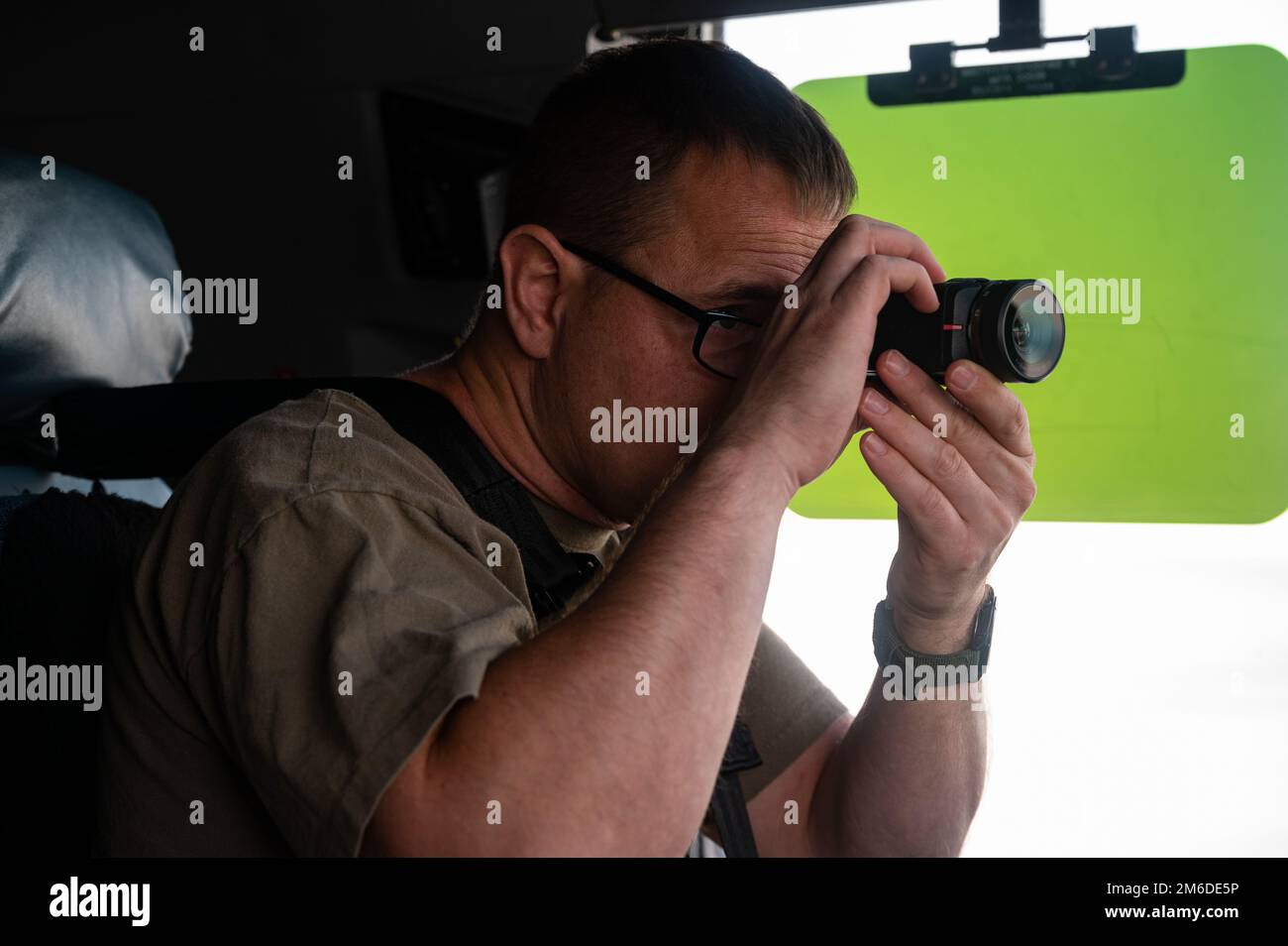 U.S. Air Force Master Sgt. Matthew Plew, an aerial combat camera ...