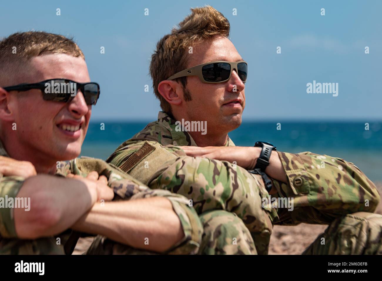U.S. Air Force Tech. Sgt. Roy Wollgast, right, an 82nd Expeditionary ...