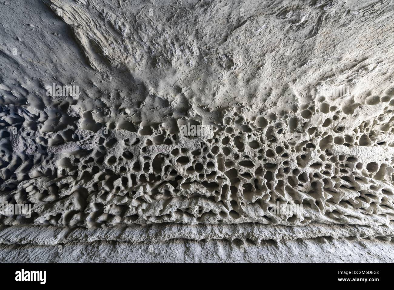 Rock formation - Birds nests Stock Photo - Alamy