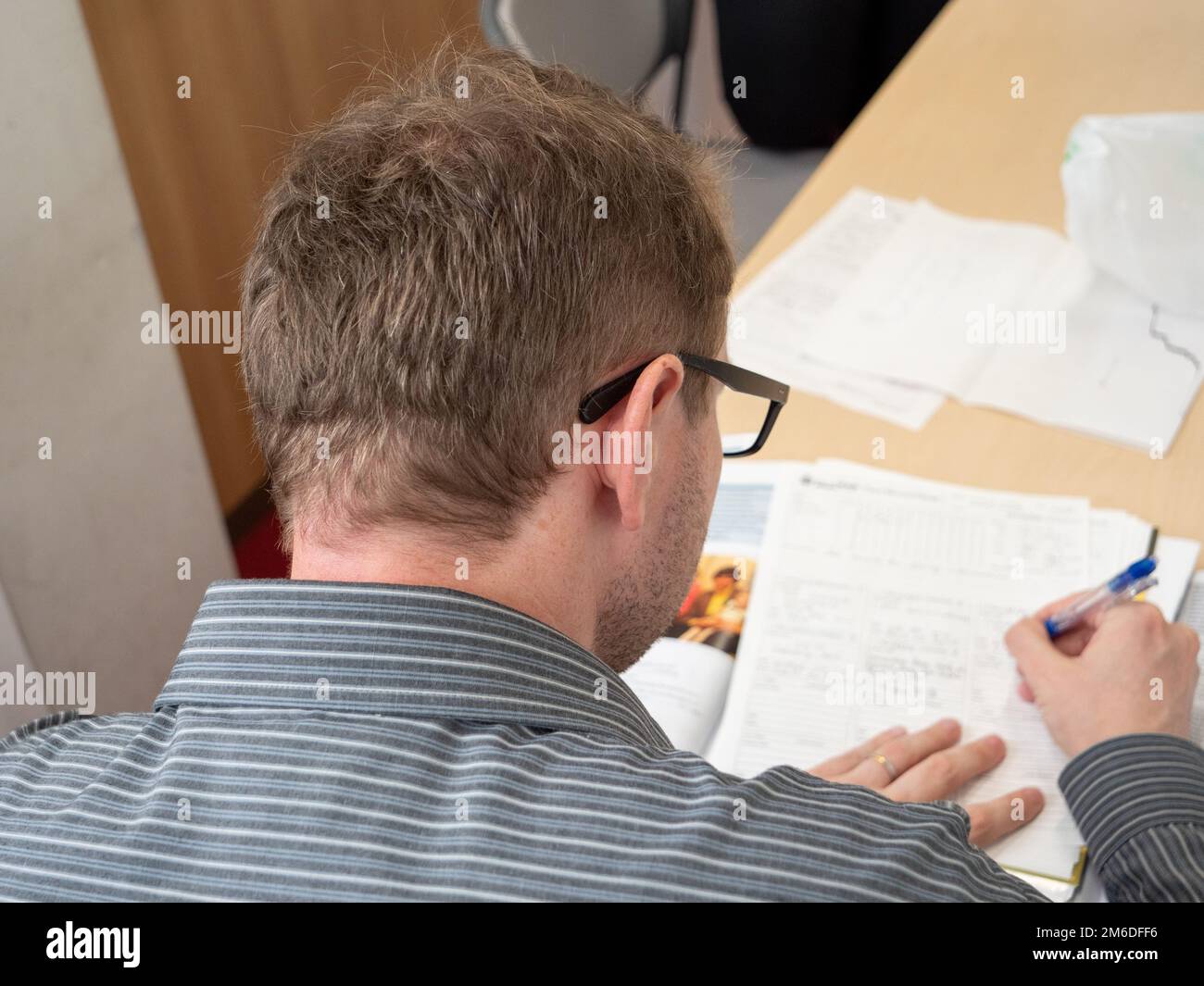 Work writing hi-res stock photography and images - Alamy