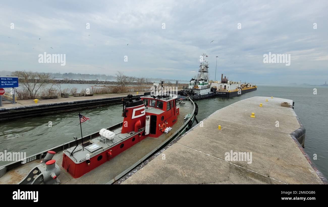 The tugboat Vermont, tugboat New York, and barge Double Skin depart the ...