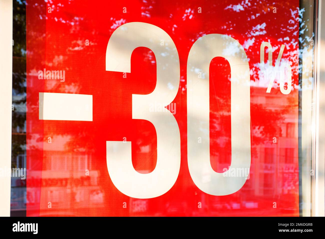 Sale. Shop window with 30 percent discount. Seasonal discounts in the ...