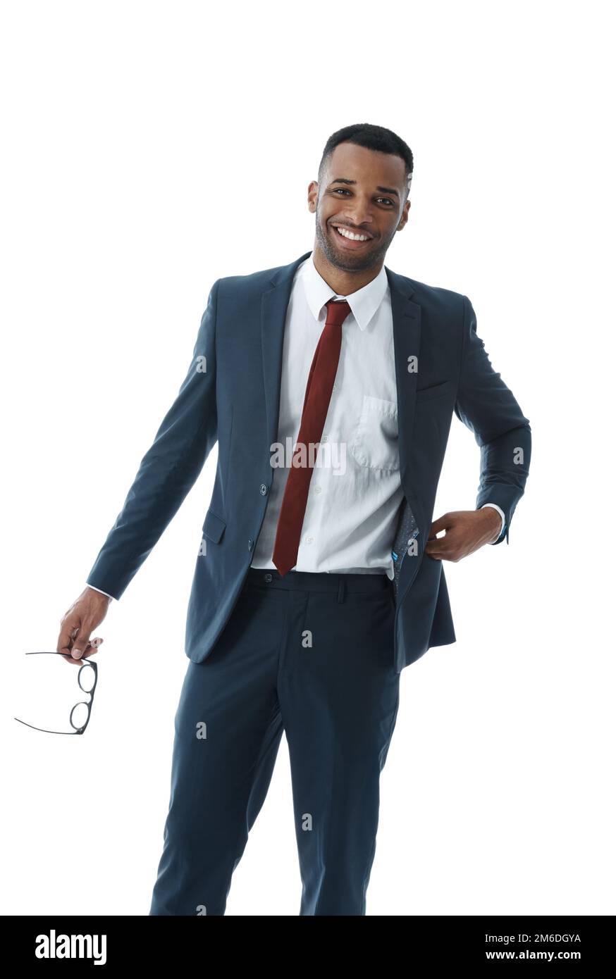 Pleased by his success. A stylish young african american businessman ...