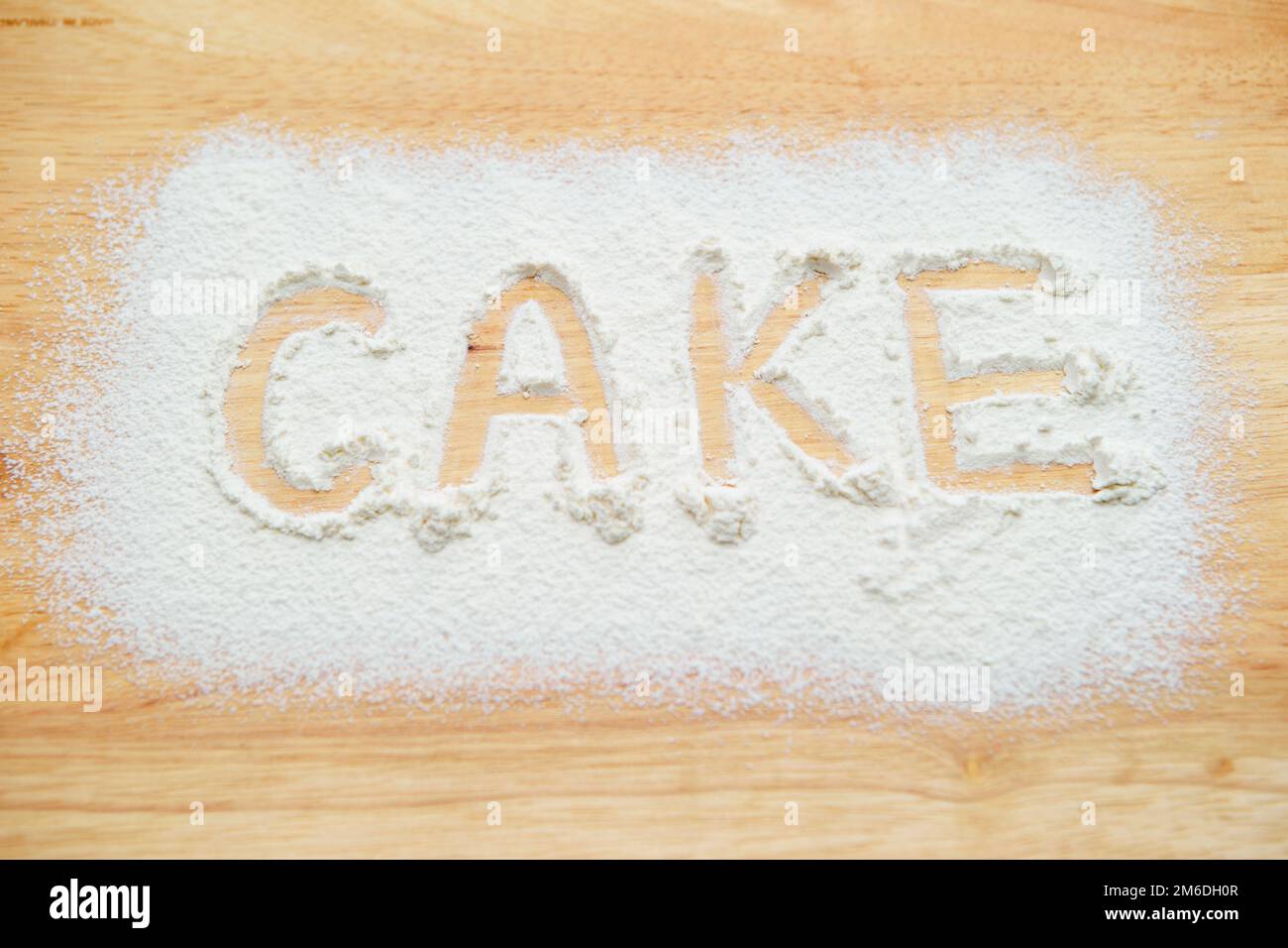 cake word written in powder Stock Photo - Alamy