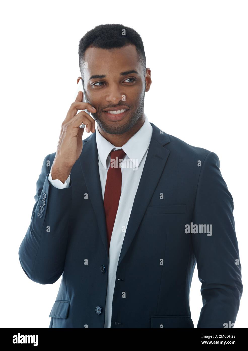 Scheduling a client meeting. An african american businessman using his ...