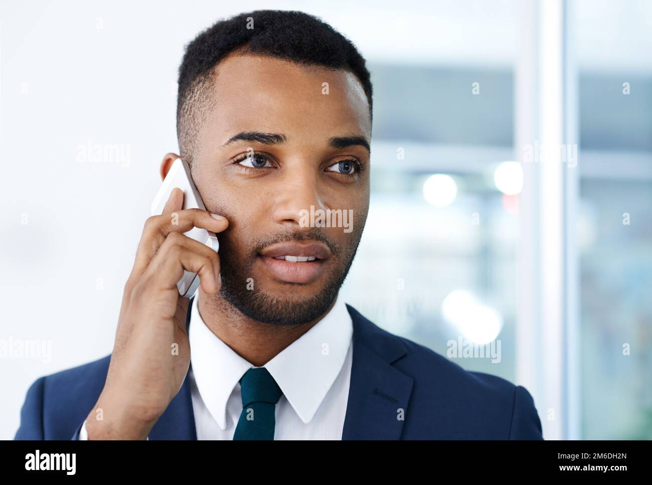 African man intently using hi-res stock photography and images - Alamy