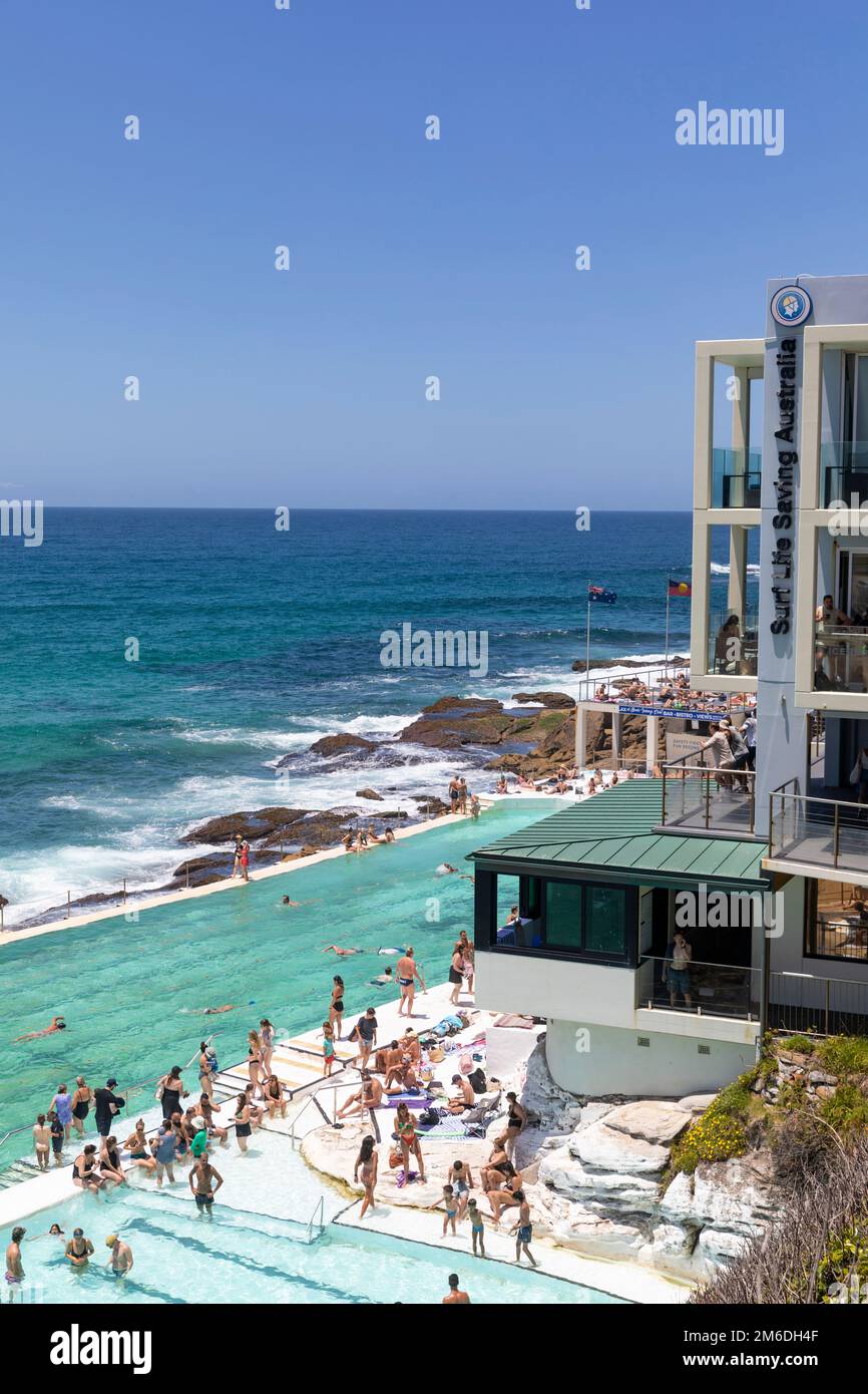 Bondi Icebergs clubhouse and outdoor swimming pools, busy with people ...