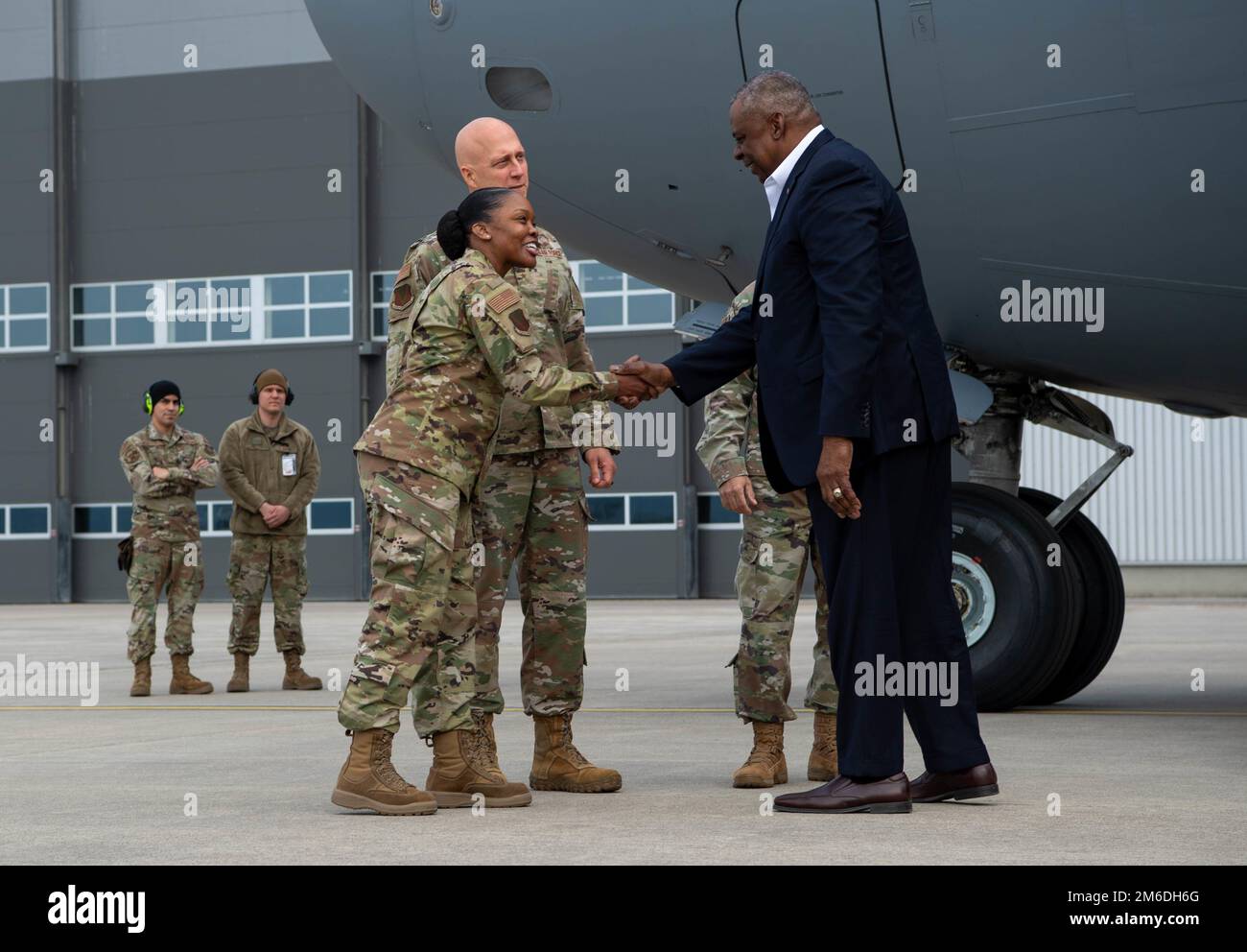 U.S. Secretary of Defense Lloyd Austin III (right to left) is greeted ...