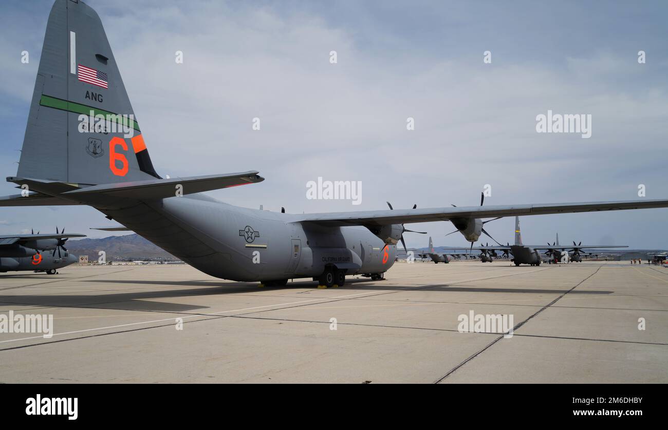 MAFFS (Modular Airborne Fire Fighting System) equipped C-130 Hercules ...