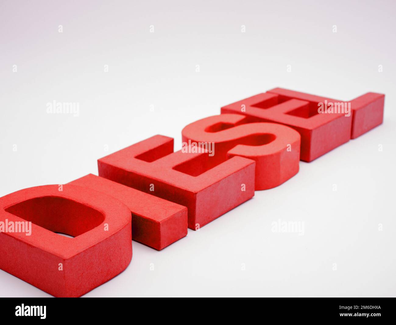Red 3D letters Diesel isolated on white Stock Photo - Alamy