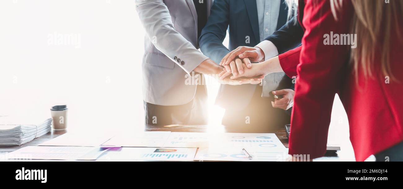 Close up Asian Business people stack of hands working together ...