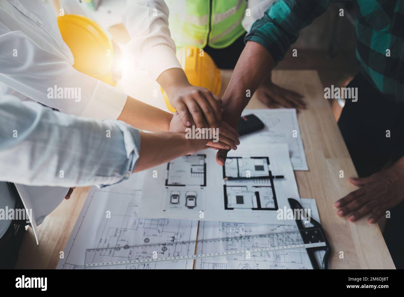 Architect people working with blueprints. Civil engineer teams meeting ...