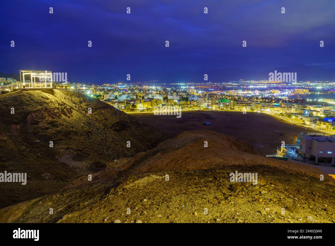 Evening view of Eilat (southern Israel), Aqaba (Jordan) with an ...