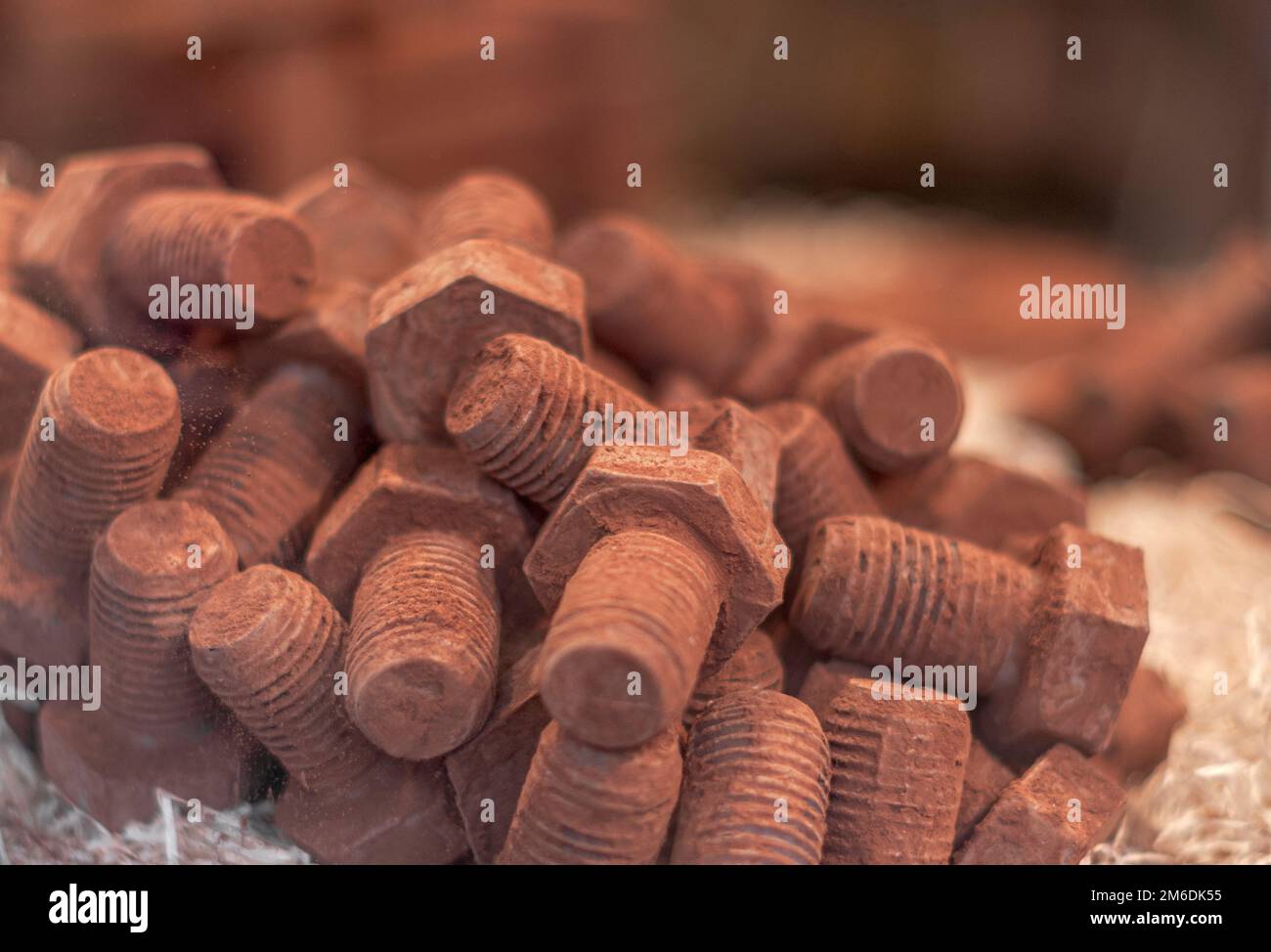 chocolate stylized bunch of rusty bolts Stock Photo - Alamy