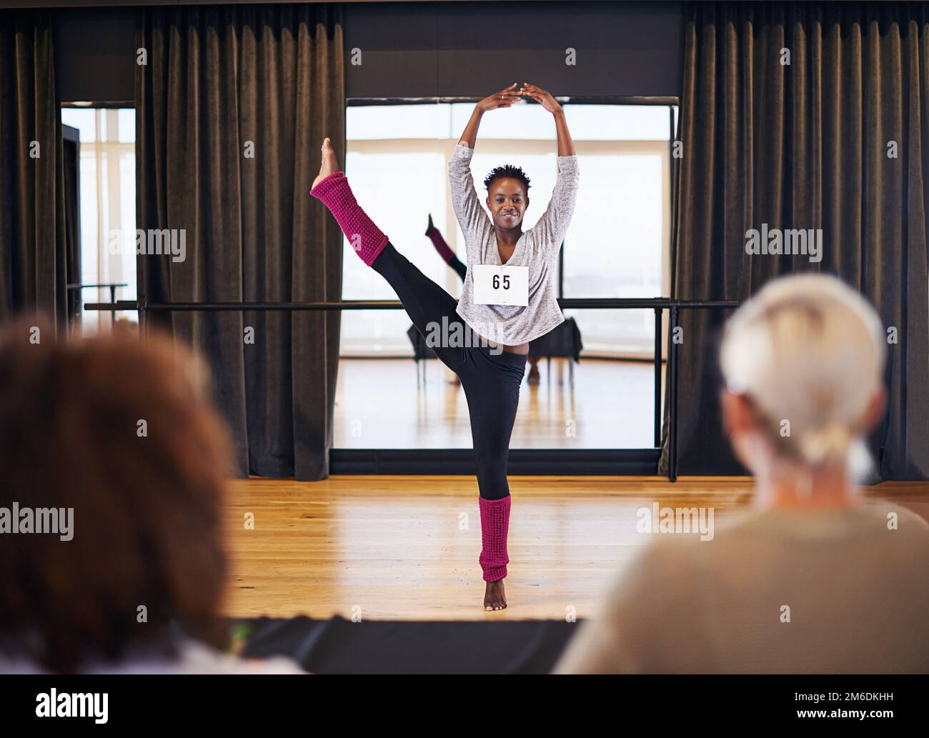 Wowing them with her moves. a female dancer performing before the ...