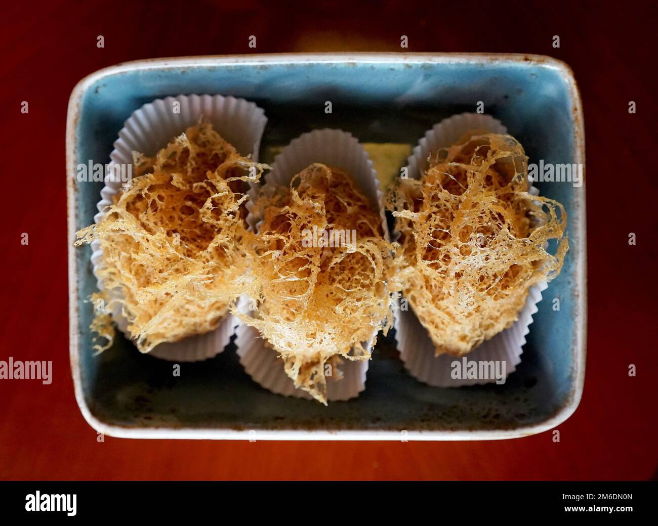 Hamburg, Germany. 02nd Jan, 2023. Taro patties Wu Gok stand on a table ...