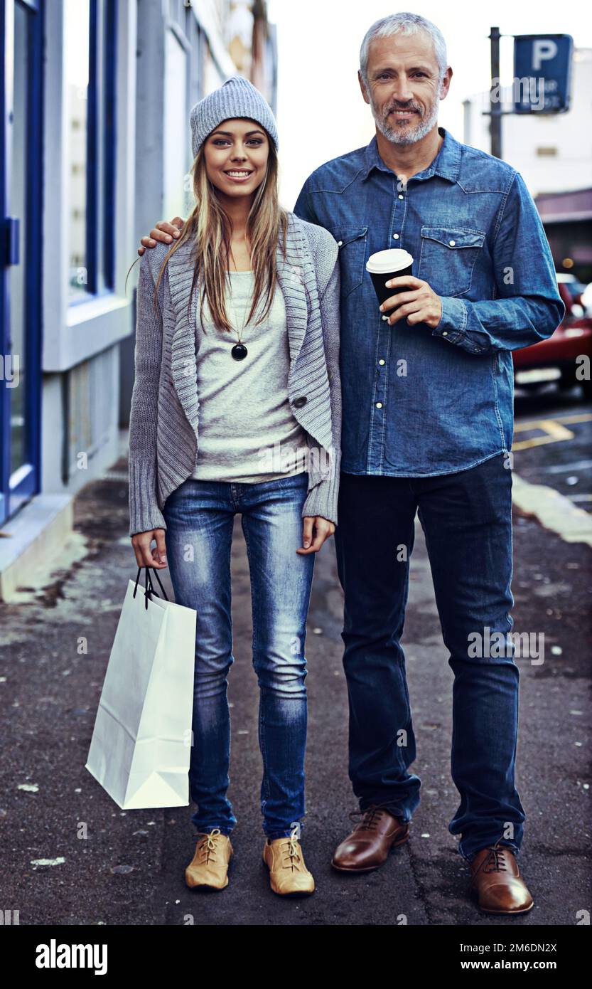 First they got coffee... then they hit the shops. Portrait of a father ...