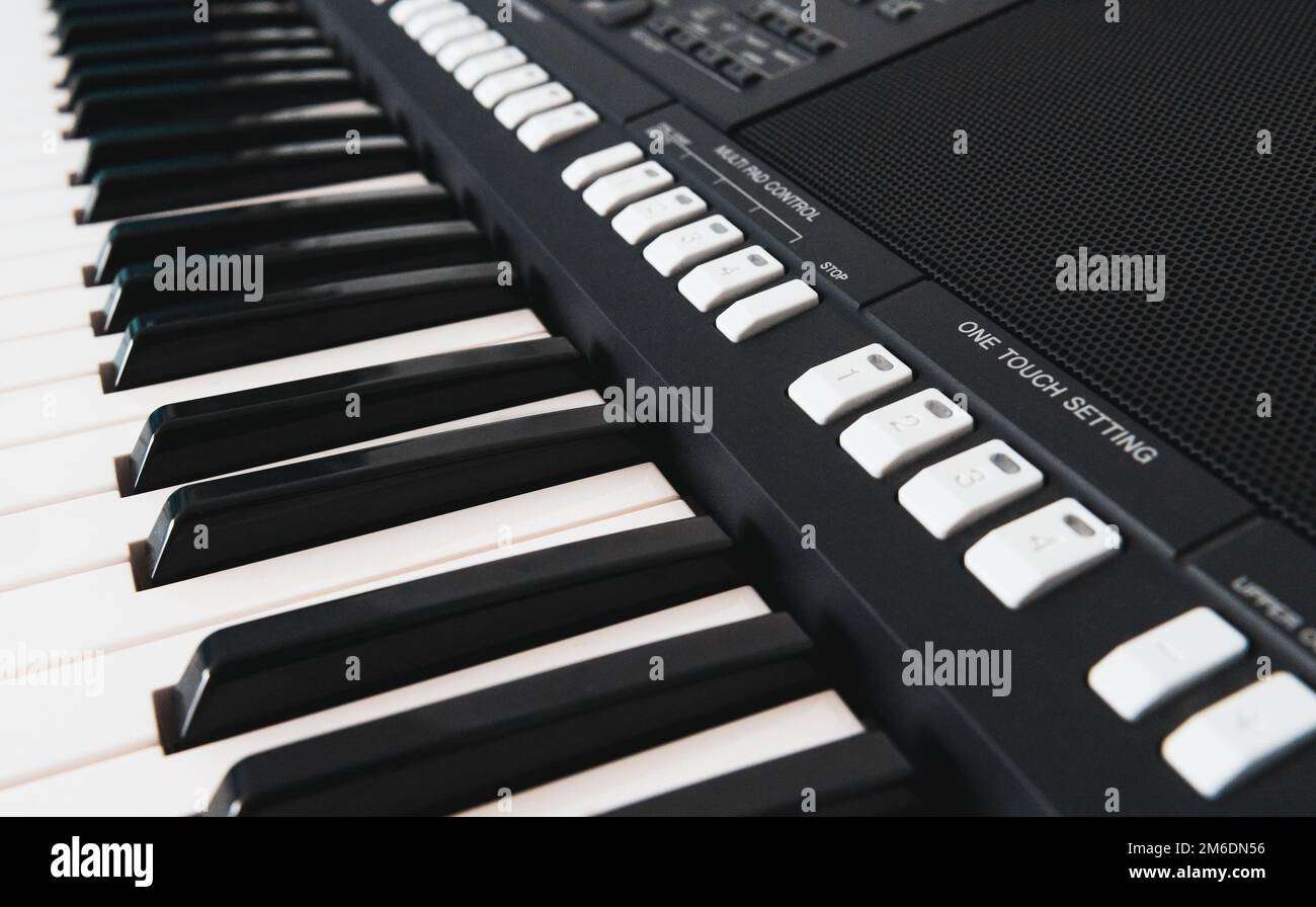 Synthesizer keyboard close-up white and black keys Stock Photo - Alamy