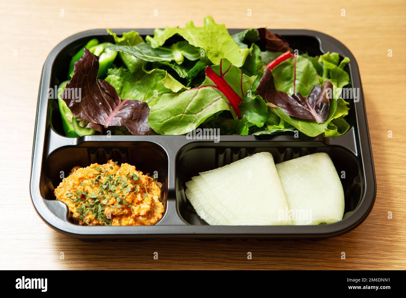Vegetable salad and side dishes in a lunch box Stock Photo - Alamy