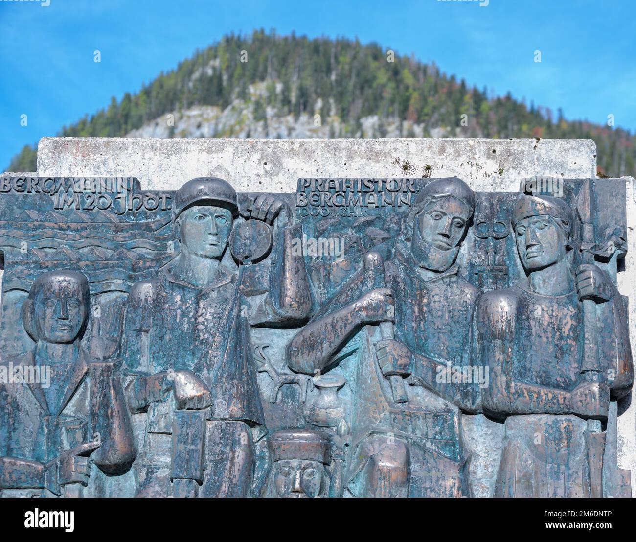 View of a carved monument at the salt mine village of Hallstatt ...
