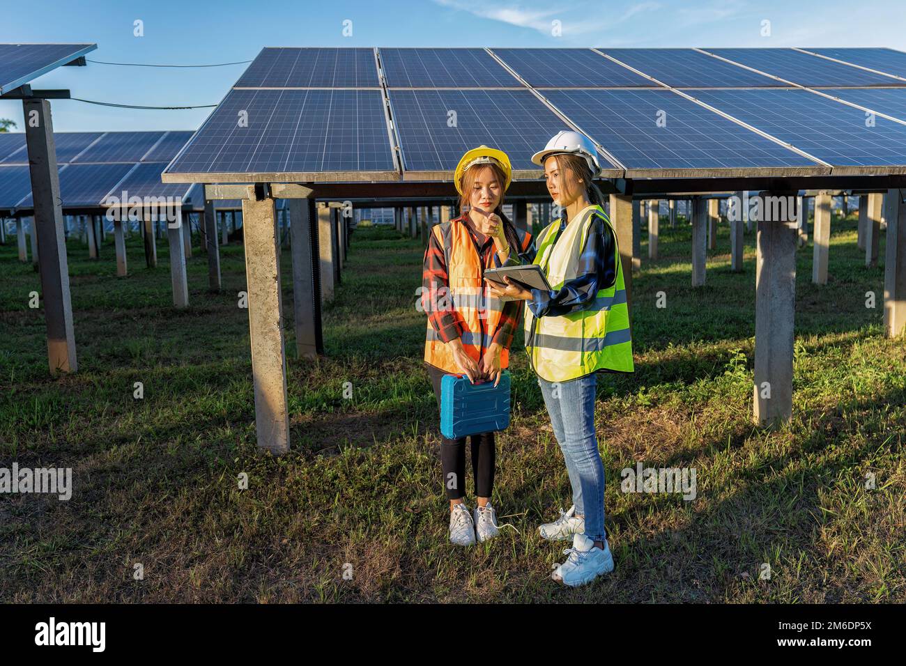 2 maintenance girl engineer carry tool box routine maintenance at ...