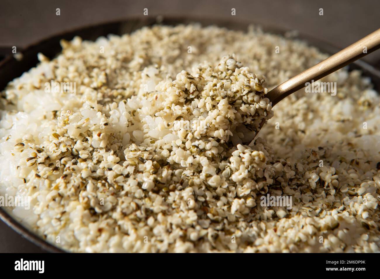 Hemp seeds on rice,Delicious freshly cooked cauldron rice Stock Photo ...