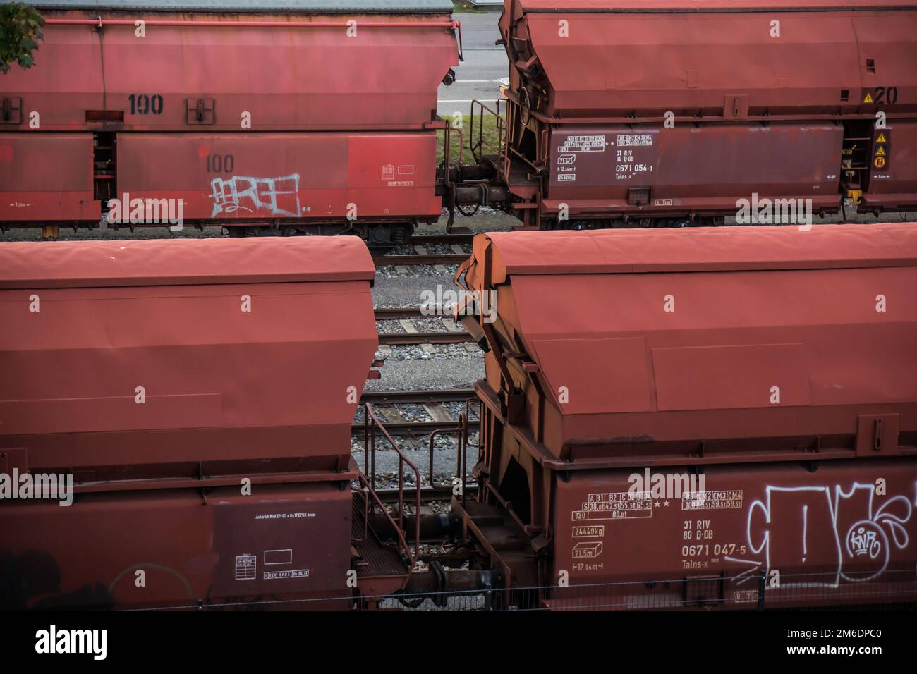 Red train container on railroad Stock Photo - Alamy