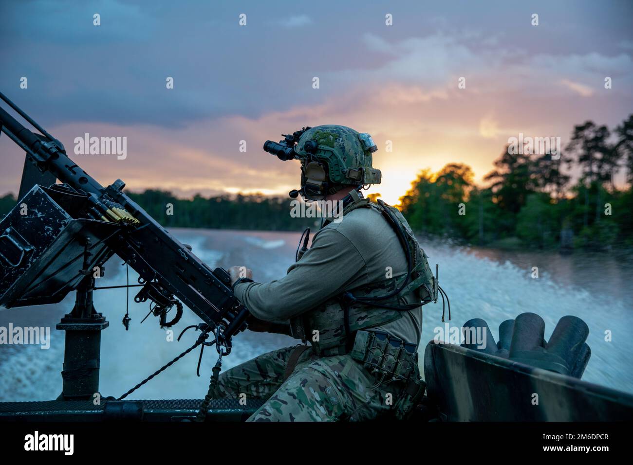 A U.S. Naval Special Warfare combatant-craft crewman operator holds his ...