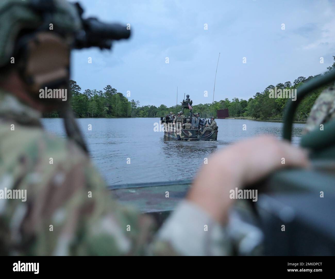 A U.S. Navy special operations craft - riverine carrying U.S. service ...