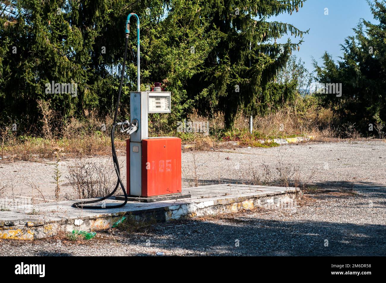 Old abandoned vintage obsolete petrol fuel gas dispenser in former ...
